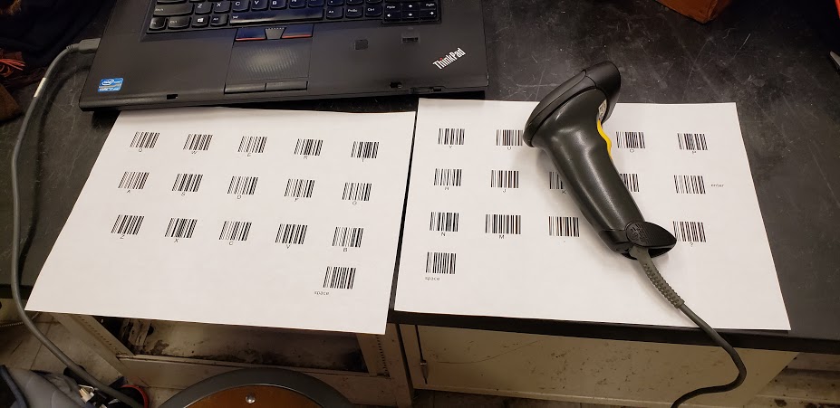 QWERTY keyboard made of barcodes | orange narwhals